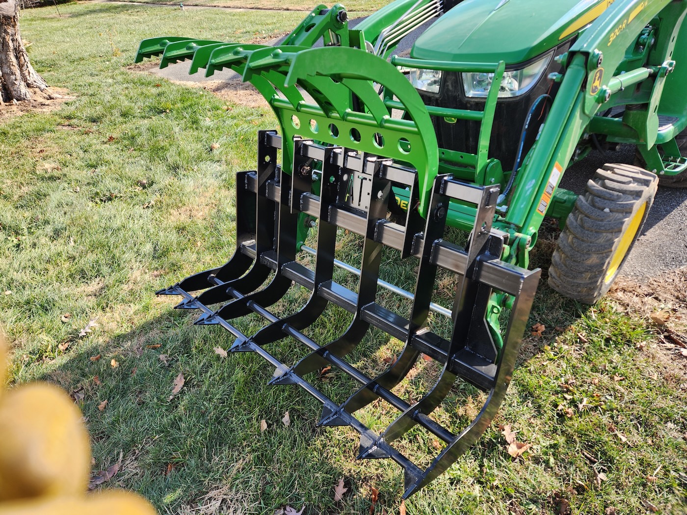 Hybrid Grapple for Compact Tractors - Earth & Turf Attachments, LLC